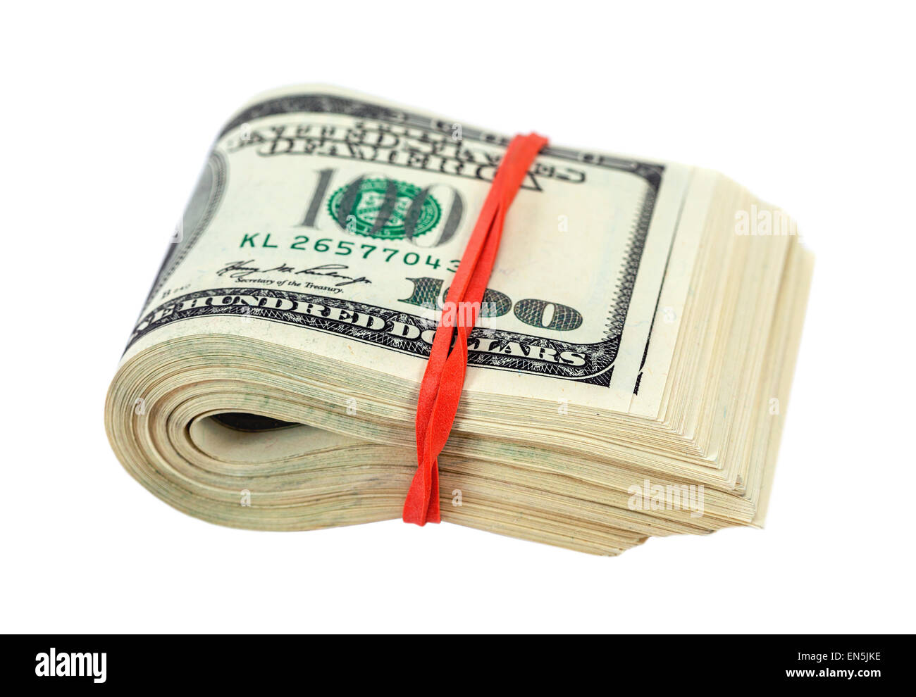 Stack of one hundred dollars banknotes wrapped by rubber on white ...