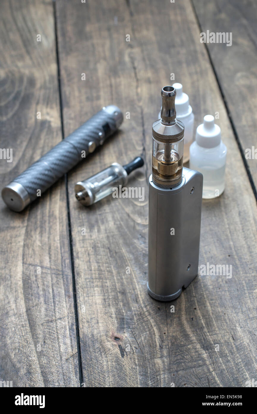 advanced vaping device on the table, e-cigarette Stock Photo - Alamy