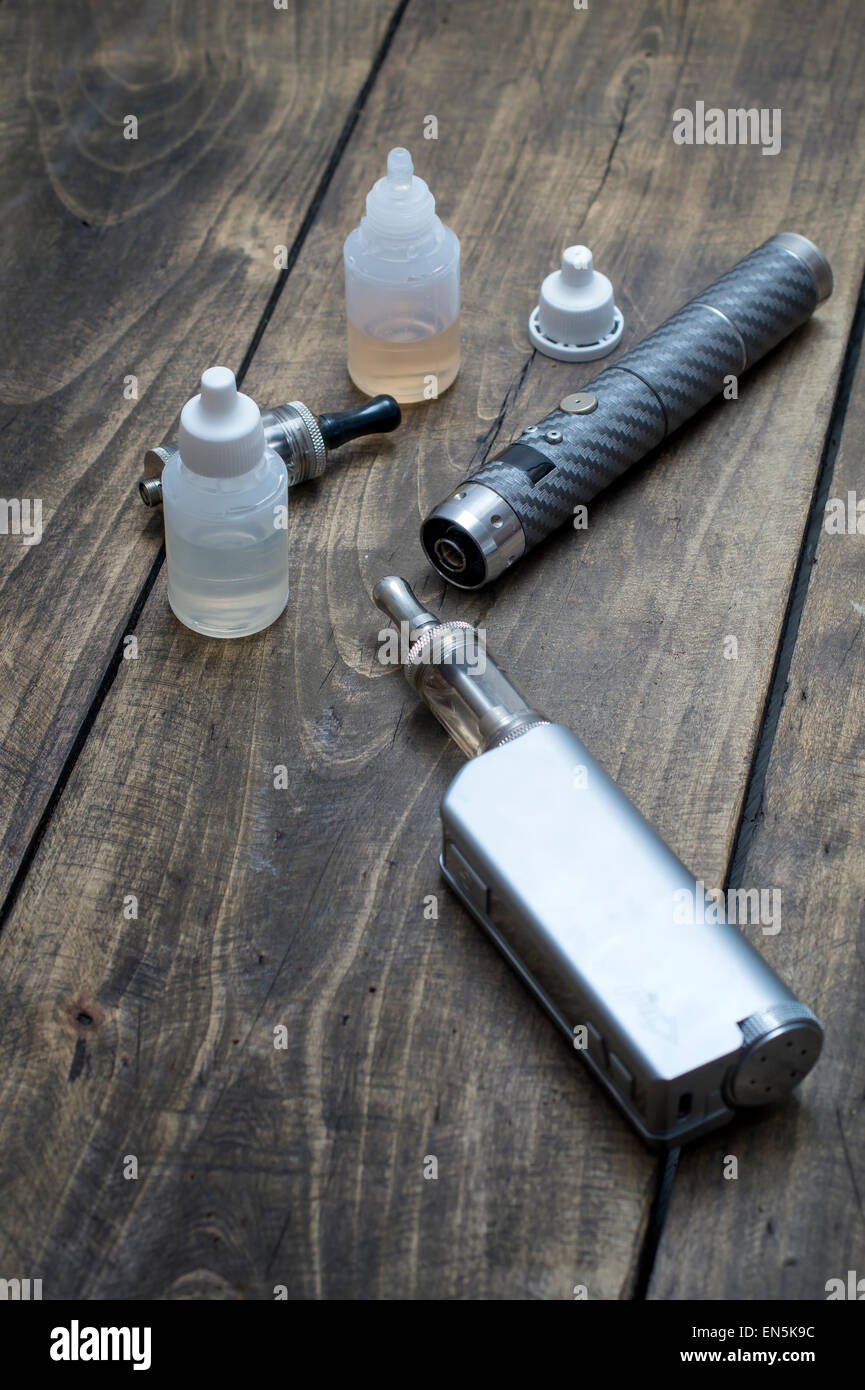advanced vaping device on the table, e-cigarette Stock Photo - Alamy
