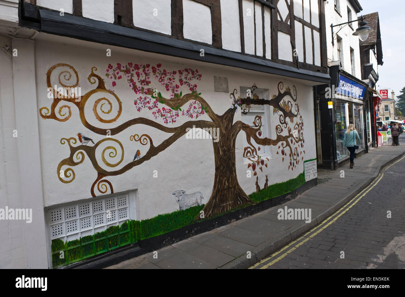 Mural of apple tree on wall of building in town of Leominster ...