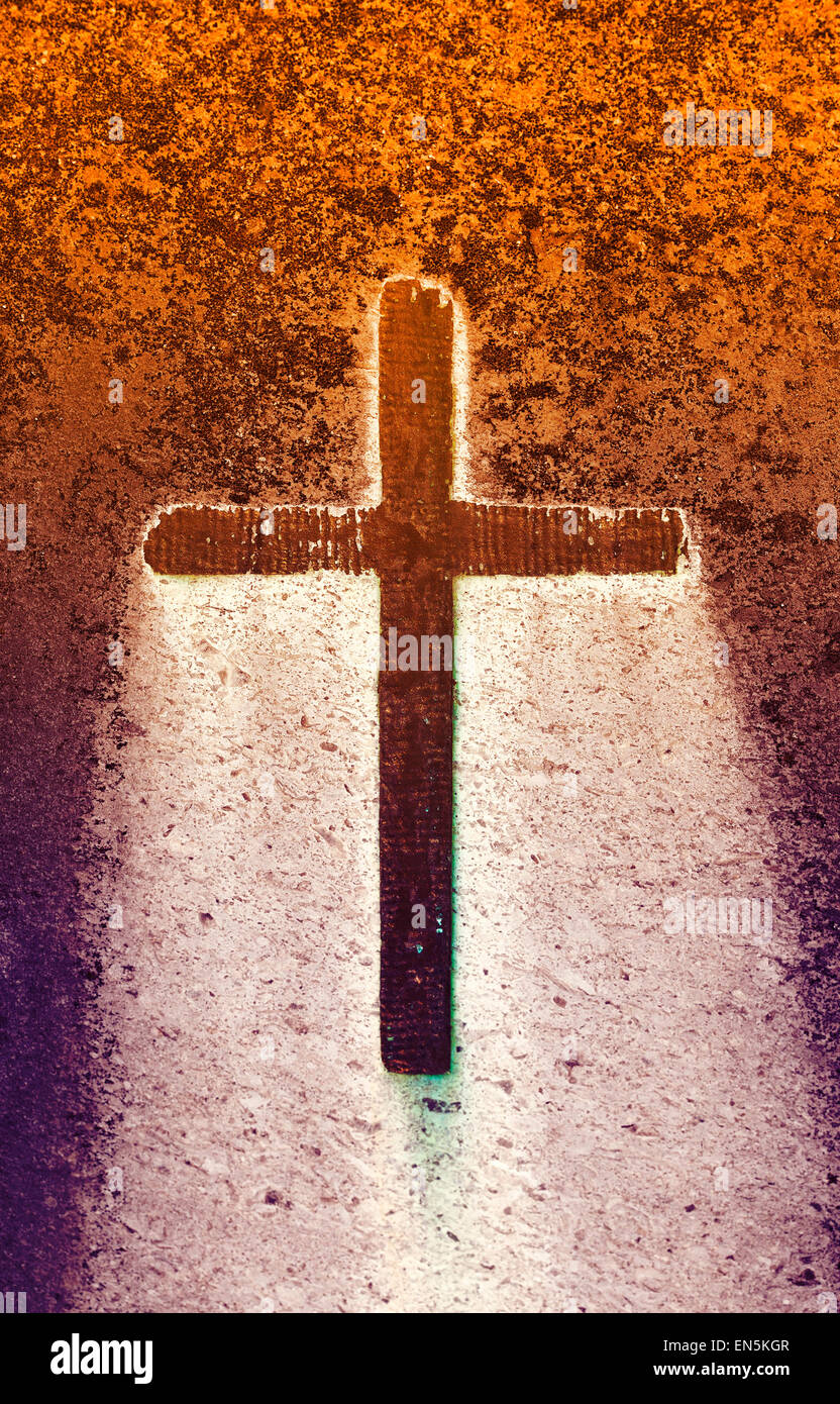 Concrete cross on a stone with a gradient colors Stock Photo - Alamy
