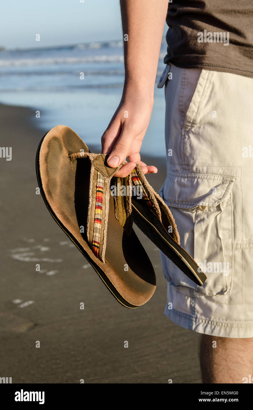 Slipper in hand hi-res stock photography and images - Alamy