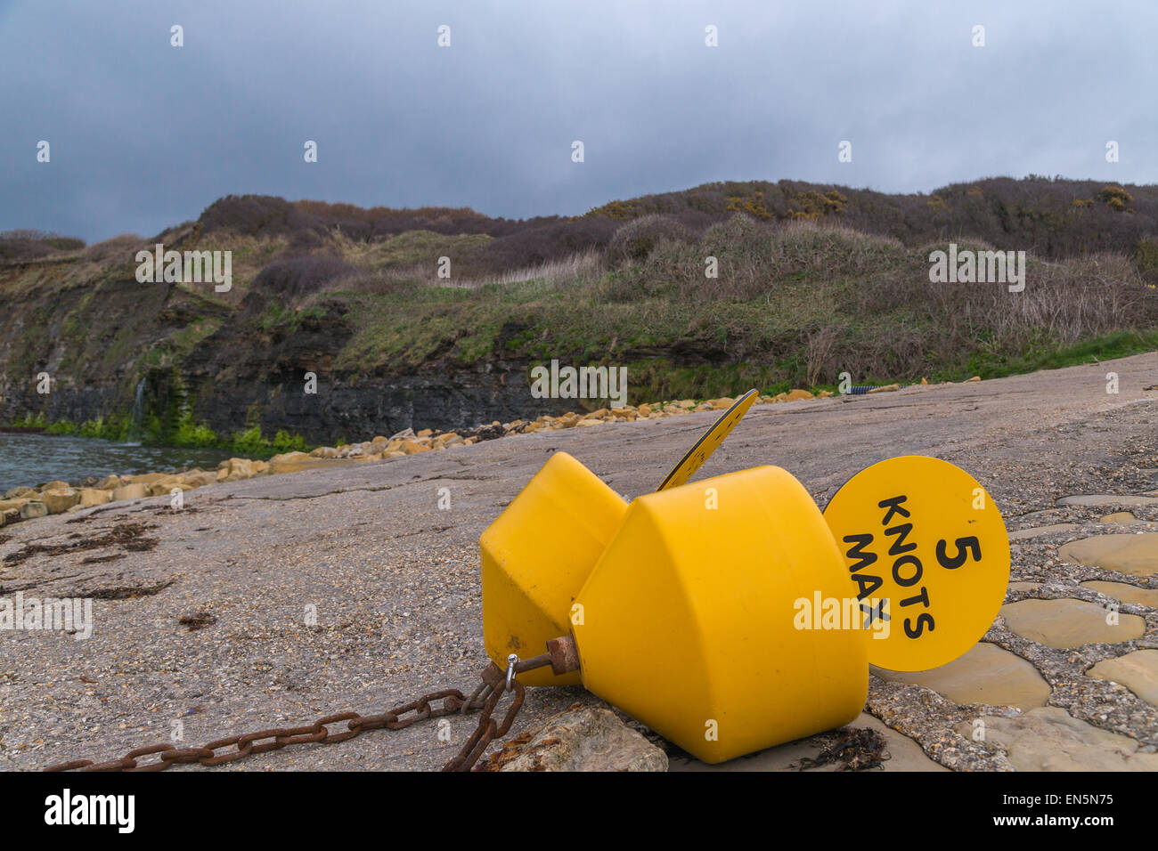 Yellow buoy on the port Stock Photo - Alamy