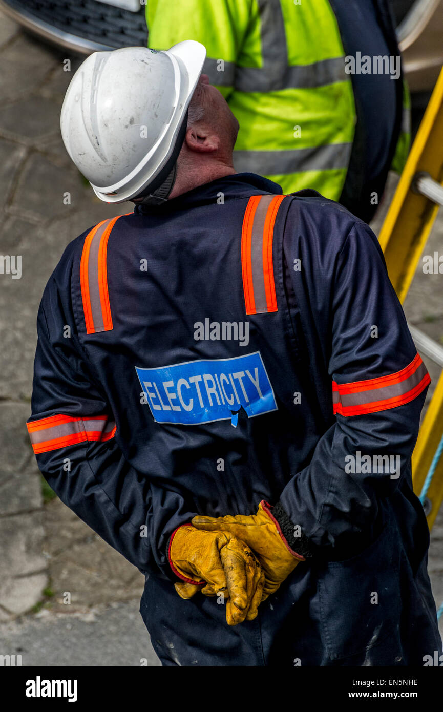 Electricity; Men at work Stock Photo - Alamy