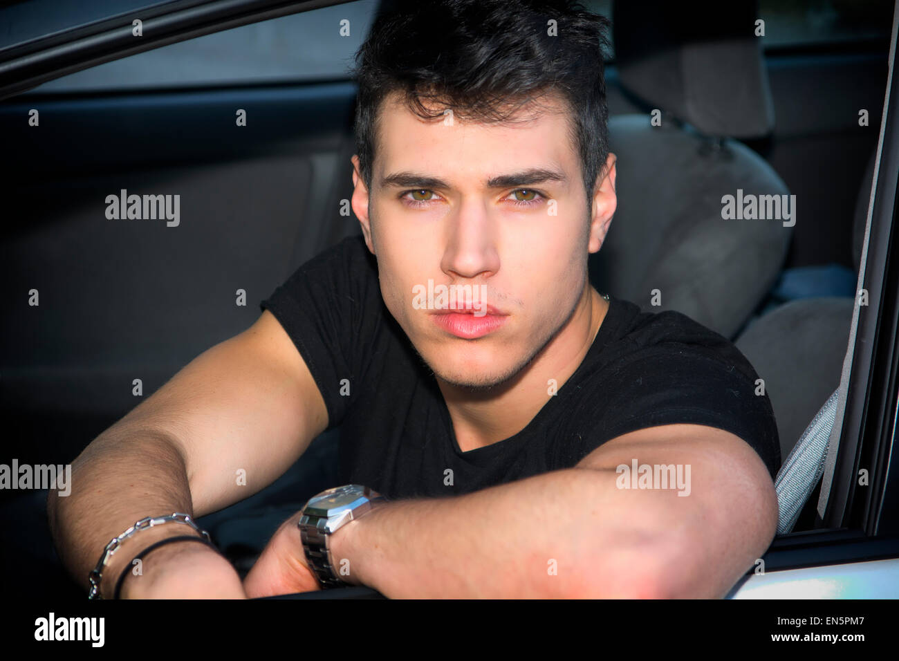 Serious young man or teenager driving car Stock Photo - Alamy Serious young man or teenager driving car Stock Photo - Alamy