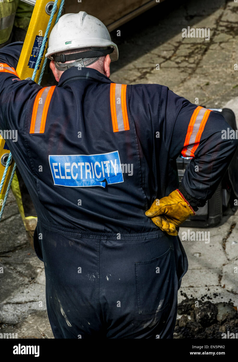 Electricity; Men at work Stock Photo - Alamy