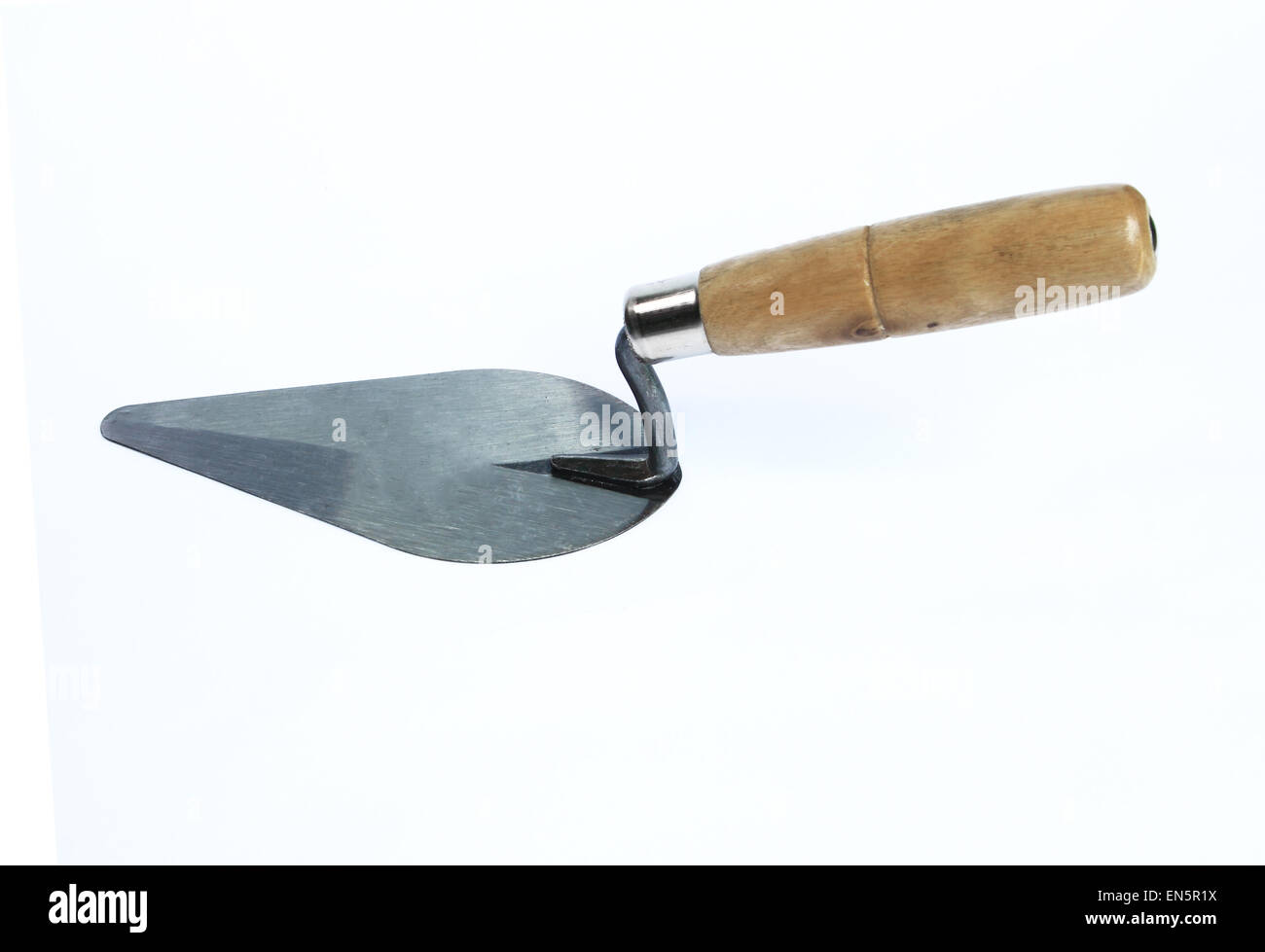 Old steel trowel isolated on white background Stock Photo - Alamy