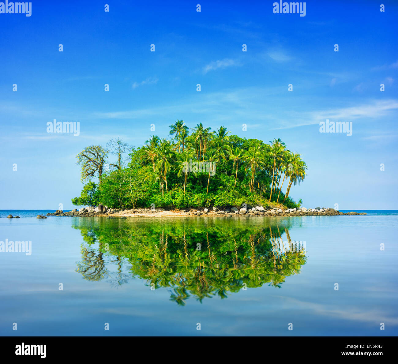 Bold, tropical colors of this pretty little island under a sunny sky ...