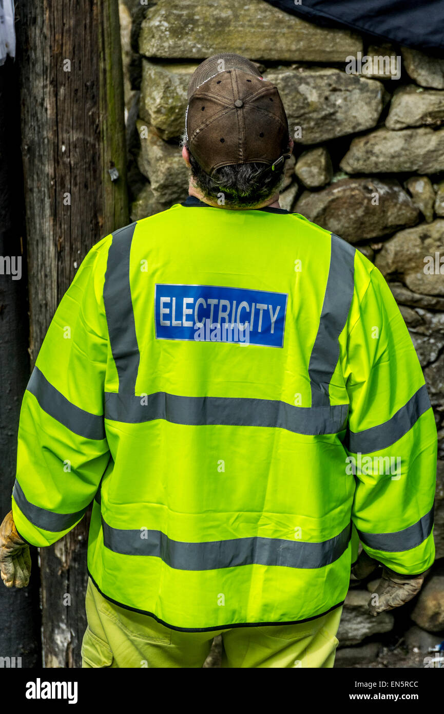 Electricity; Men at work Stock Photo - Alamy