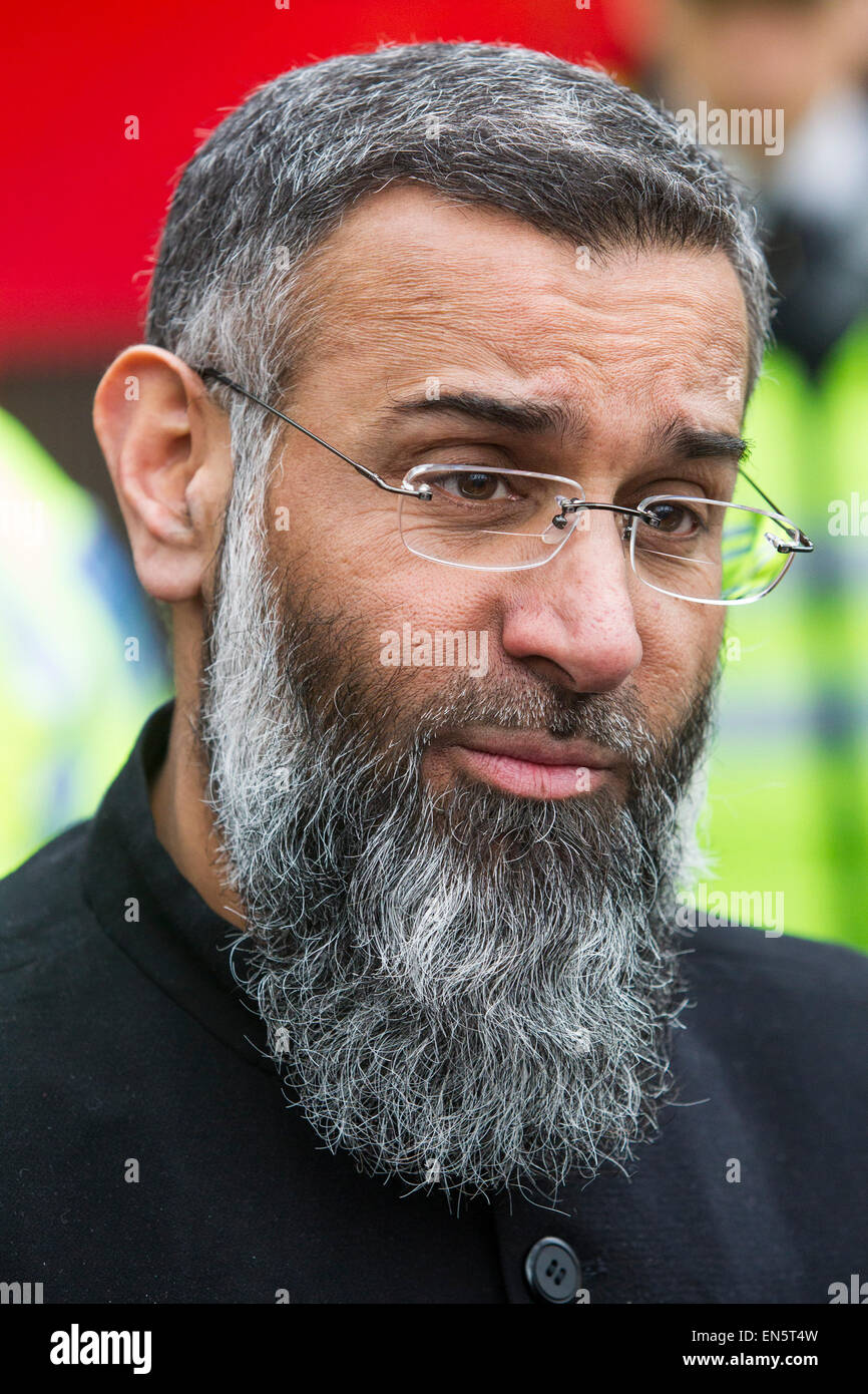 Preacher Anjem Choudary addresses a crowd outside Regents Park Mosque ...