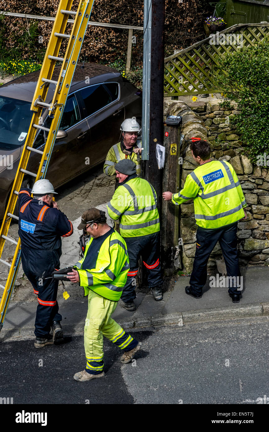 Electricity; Men at work Stock Photo - Alamy