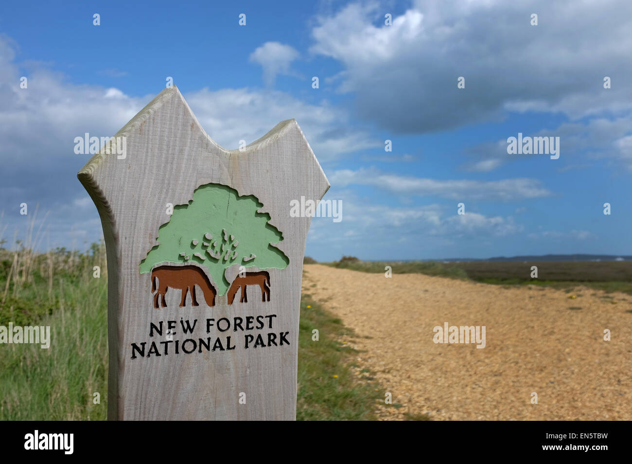 New Forest National Park sign against a blue cloudy sky Stock Photo - Alamy