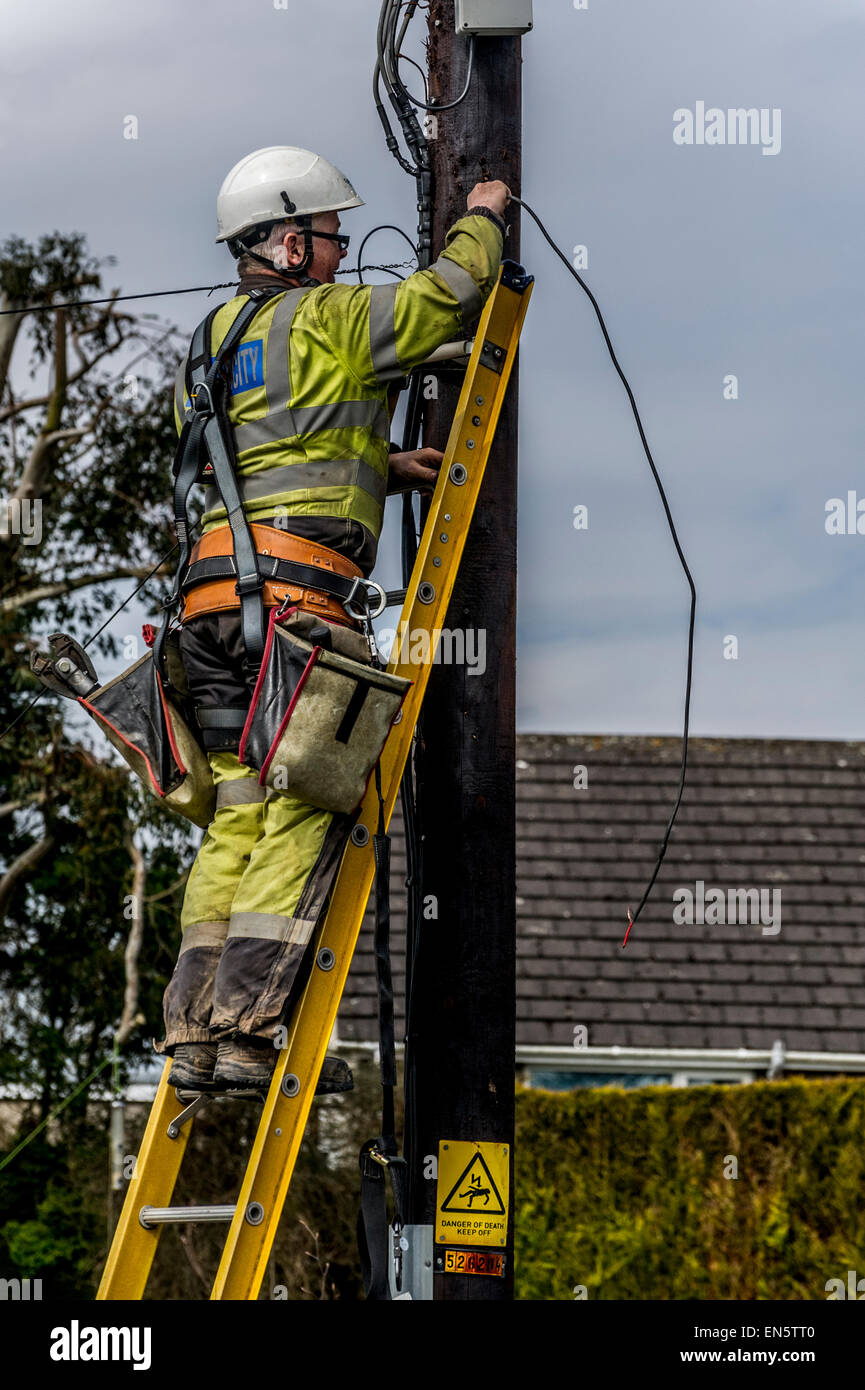Electricity; Men at work Stock Photo - Alamy