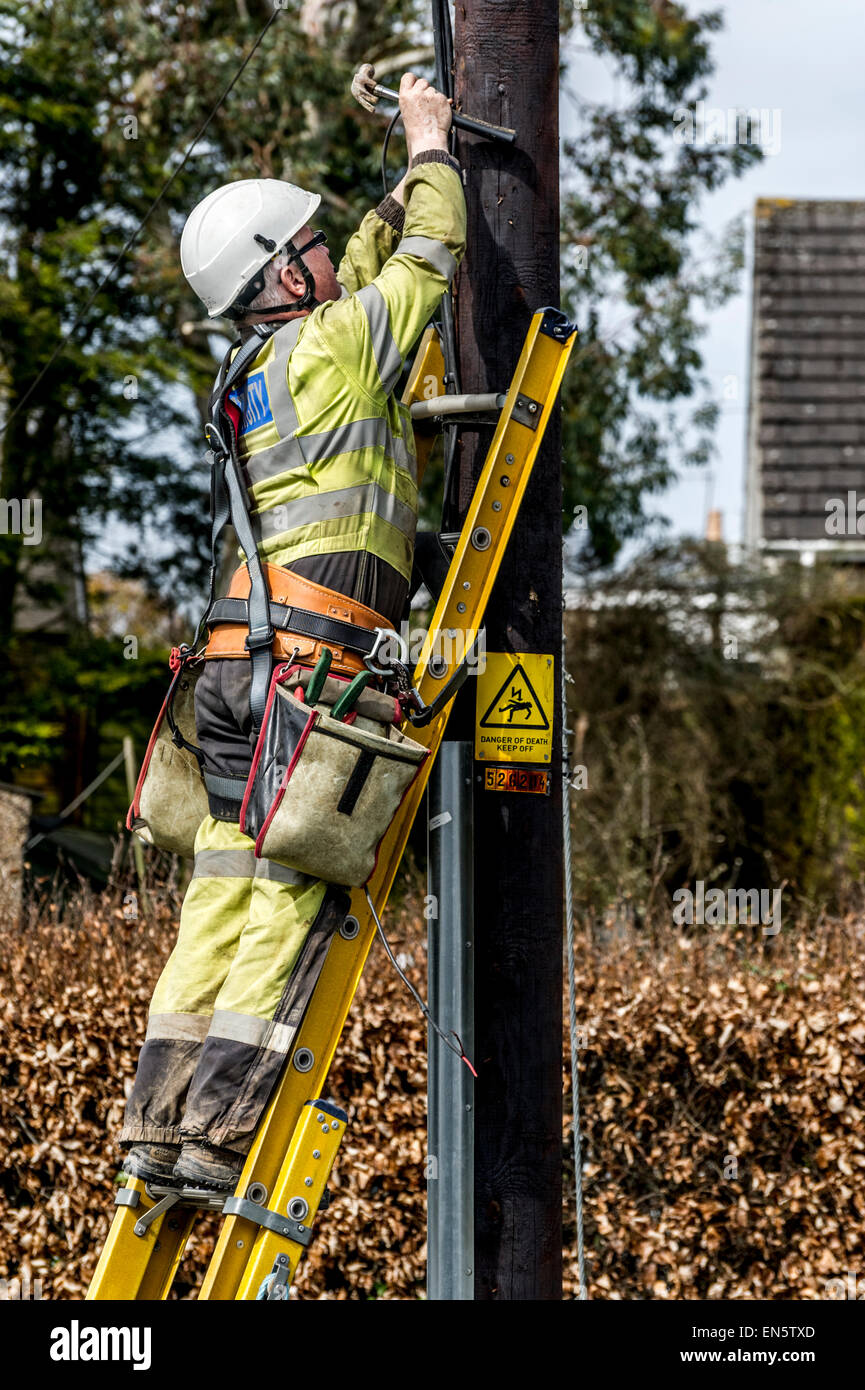 Electricity; Men at work Stock Photo - Alamy