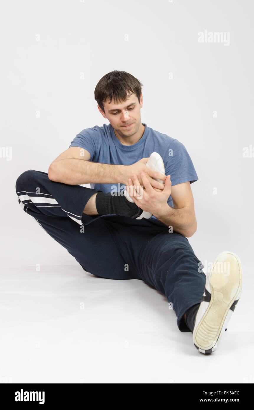 thirty young athletic man does physical exercises Stock Photo - Alamy