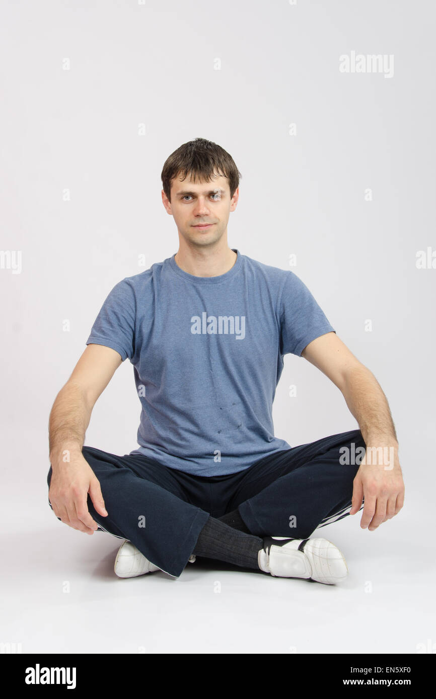 thirty young athletic man does physical exercises Stock Photo - Alamy