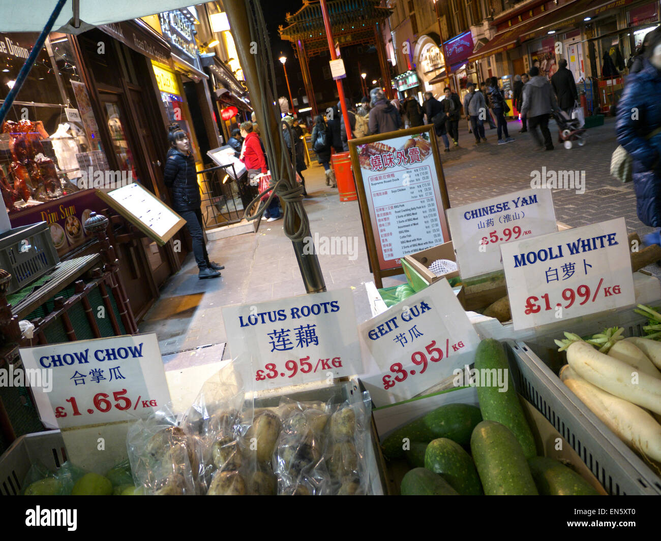 Chinese supermarket and produce display at night in Chinatown Soho ...