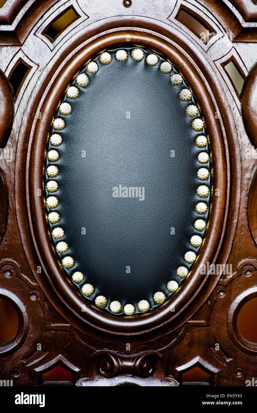 Old chair back with frame like leather detail closeup Stock Photo - Alamy