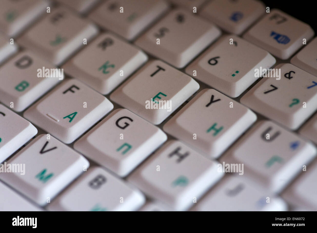 Macro of keyboard with roman and Cyrillic alphabet (shallow DOF Stock ...