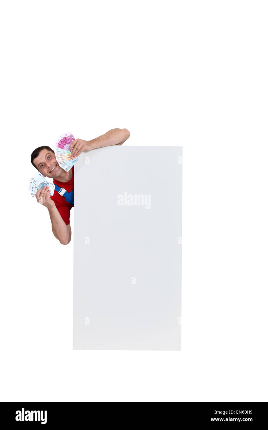 Rich man standing behind a blank sign Stock Photo - Alamy