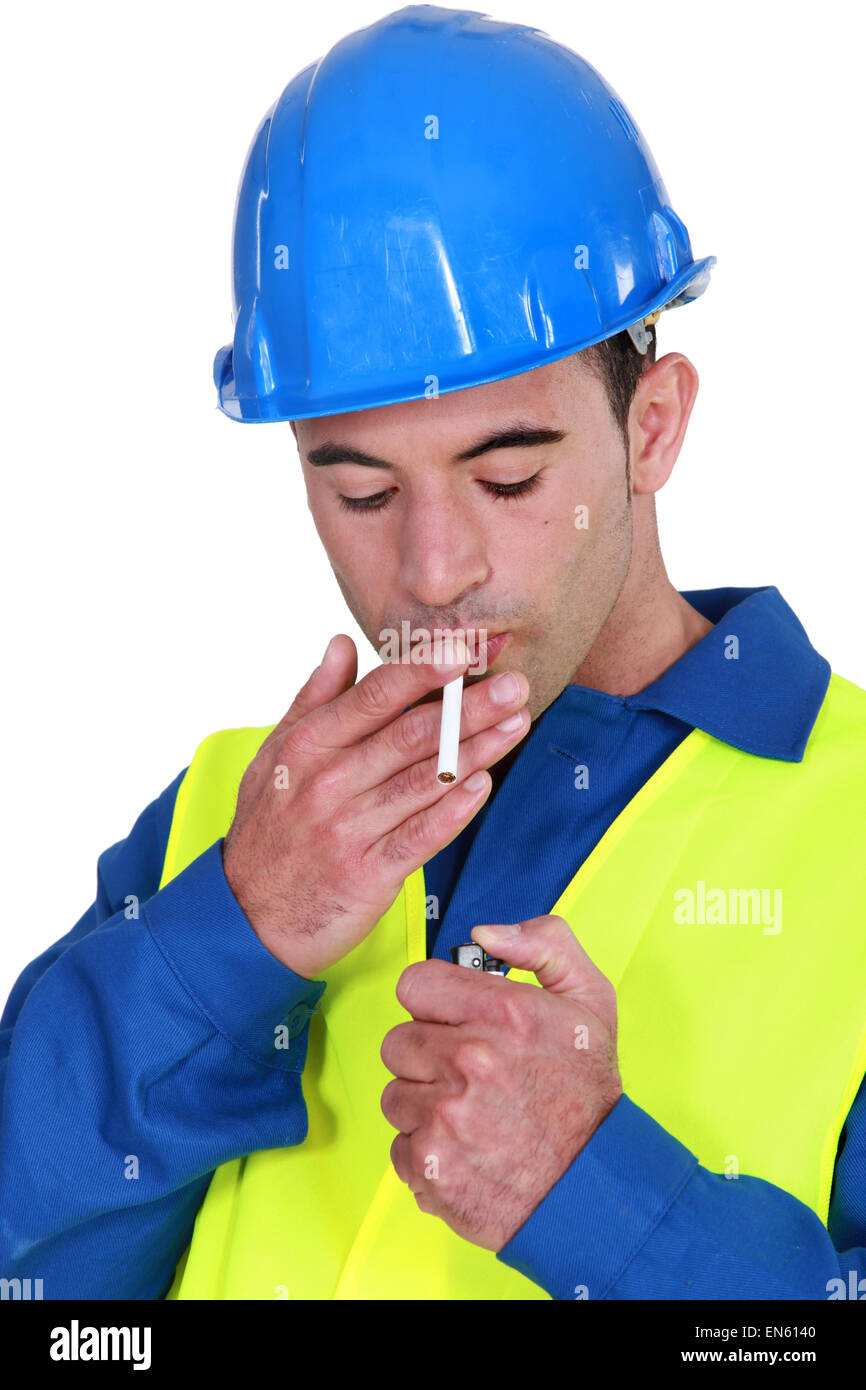 Workman smoking a cigarette hi-res stock photography and images - Alamy