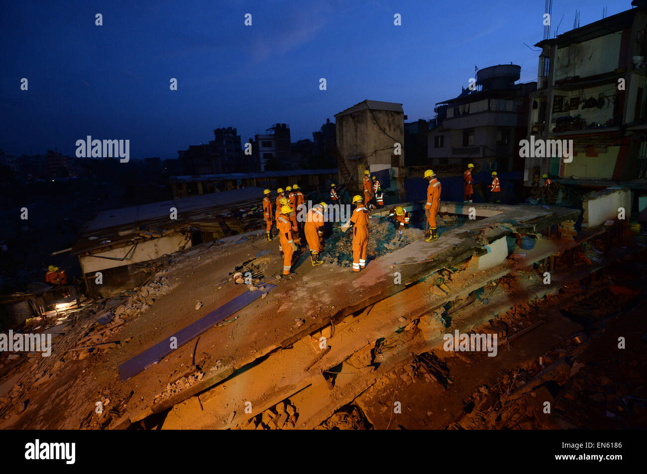 Kathmandu, Nepal. 28th Apr, 2015. Rescue personnel work on debris in ...