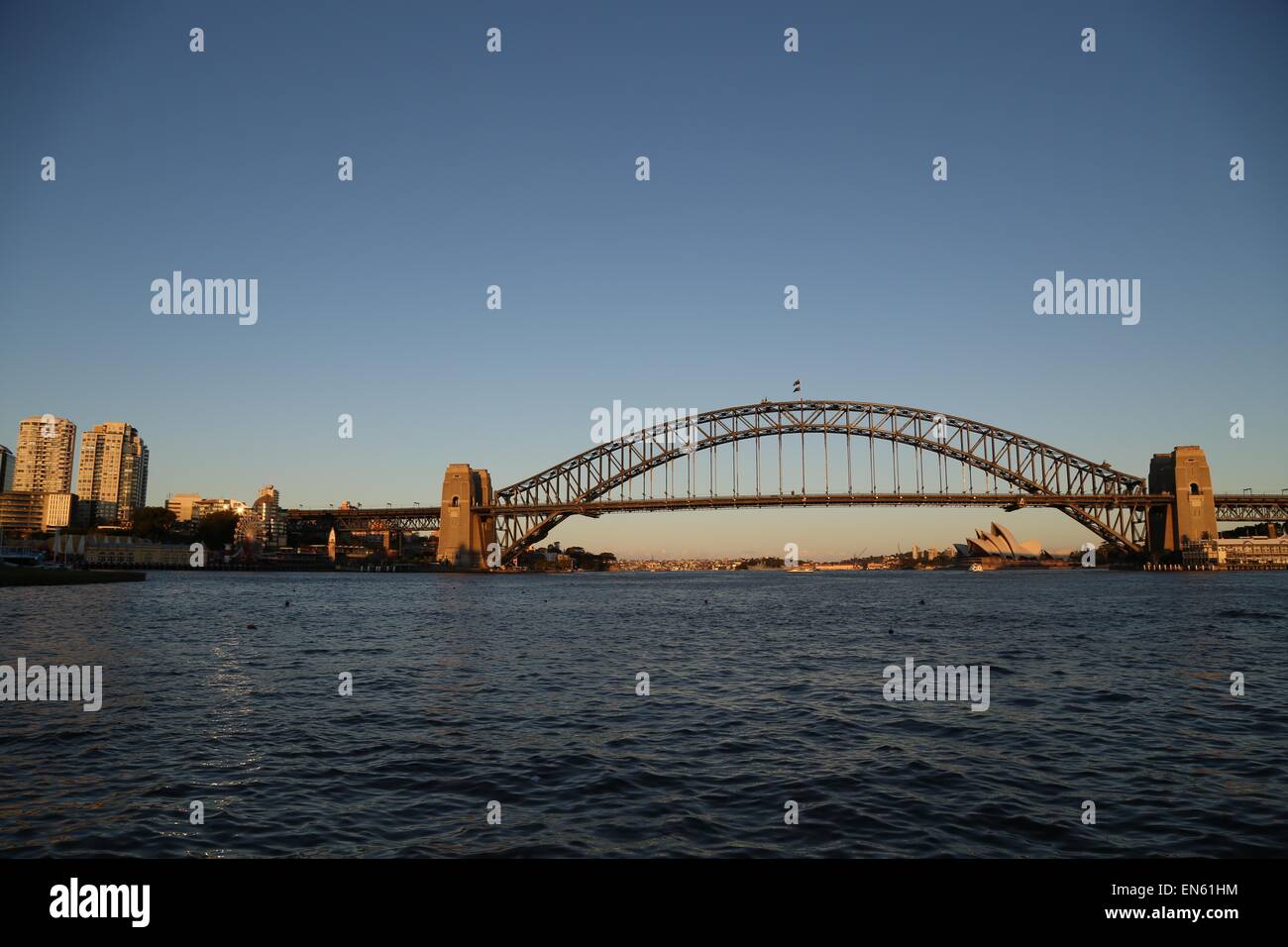 The Sydney Harbour Bridge and Opera House at dusk viewed from Blues ...