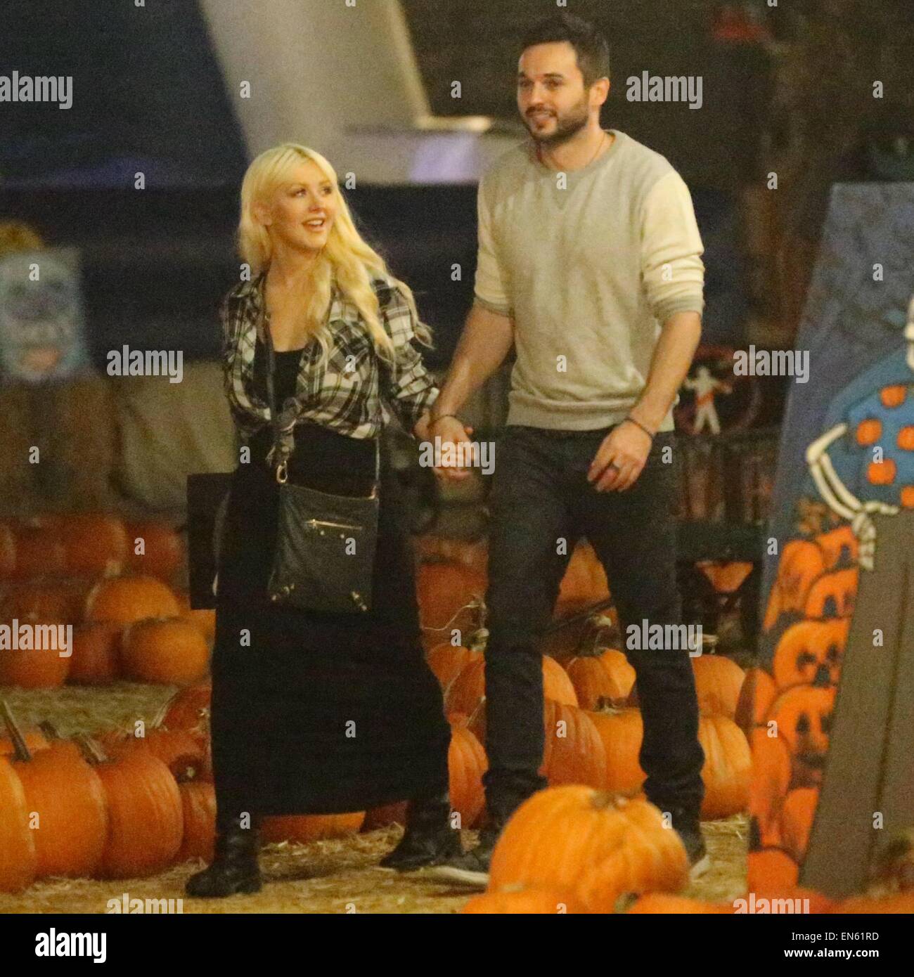 Christina Aguilera arrives at the Mr. Bones Pumpkin Patch with her fiancé Matthew Rutler ...