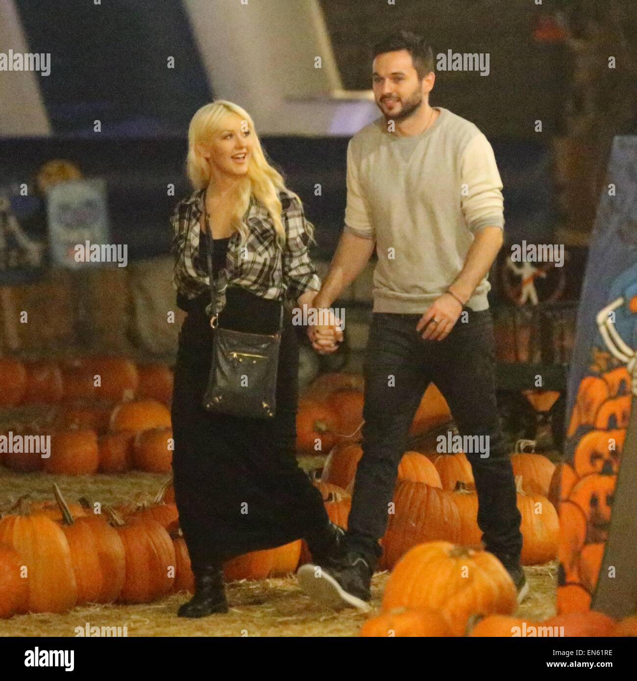 Christina Aguilera arrives at the Mr. Bones Pumpkin Patch with her fiancé Matthew Rutler ...