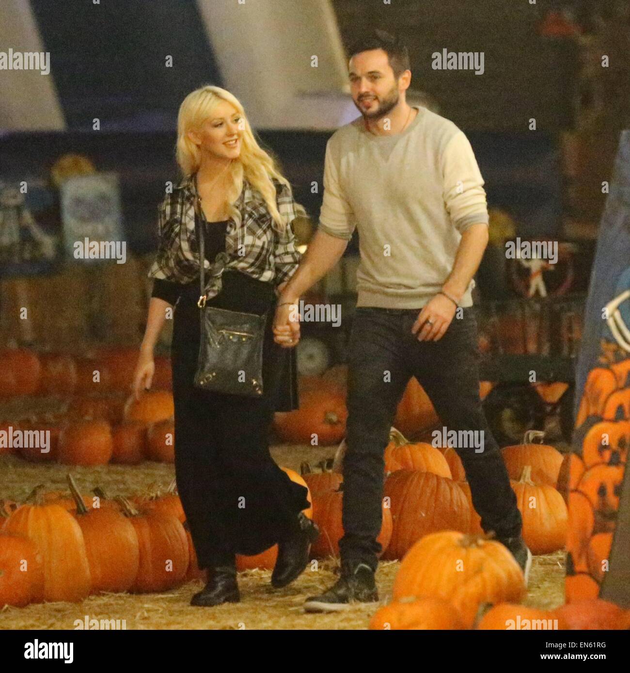 Christina Aguilera arrives at the Mr. Bones Pumpkin Patch with her fiancé Matthew Rutler ...