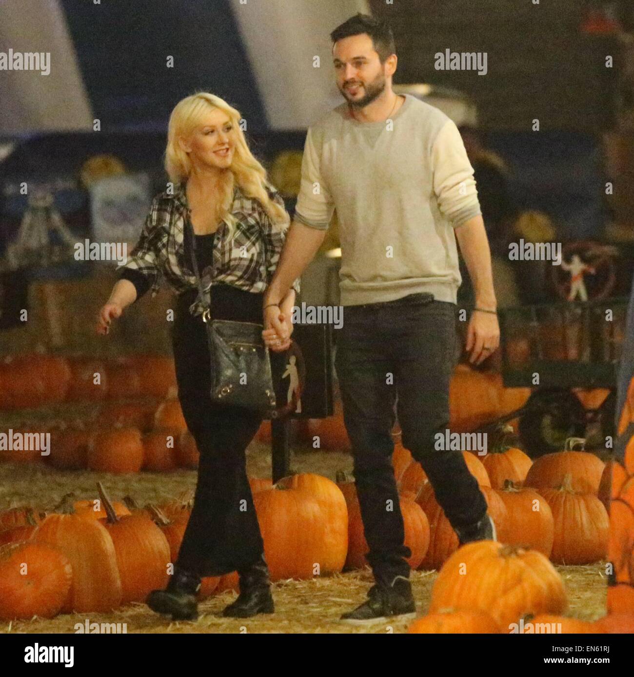 Christina Aguilera arrives at the Mr. Bones Pumpkin Patch with her fiancé Matthew Rutler ...