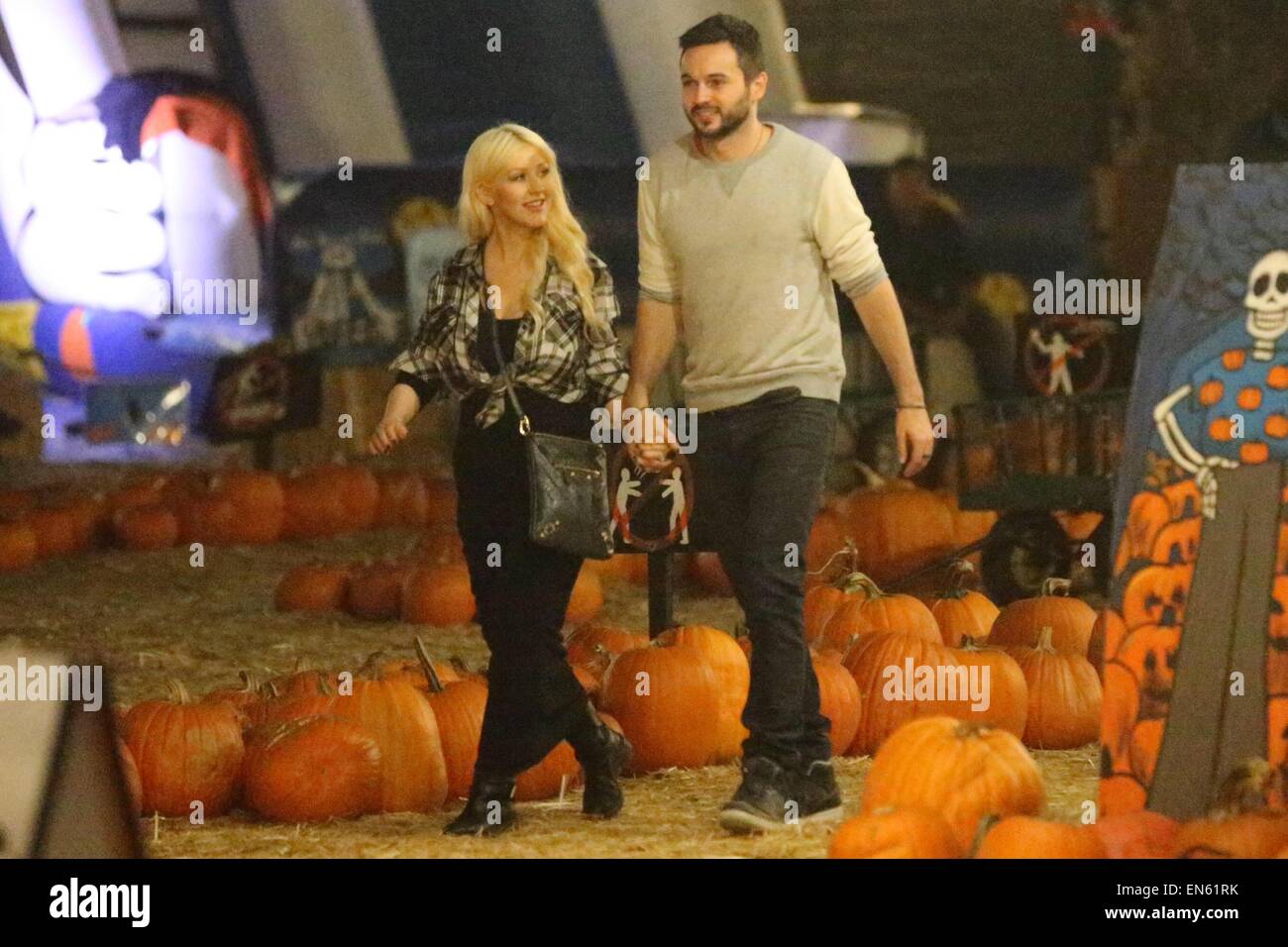 Christina Aguilera arrives at the Mr. Bones Pumpkin Patch with her fiancé Matthew Rutler ...