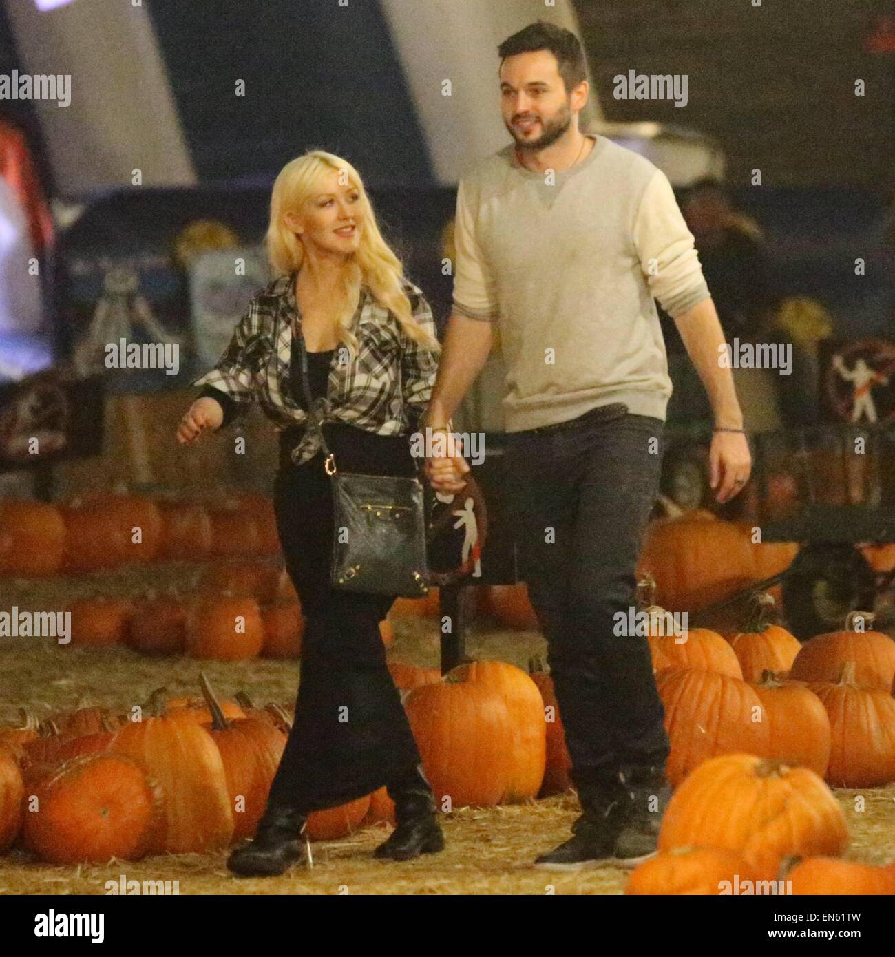Christina Aguilera arrives at the Mr. Bones Pumpkin Patch with her fiancé Matthew Rutler ...