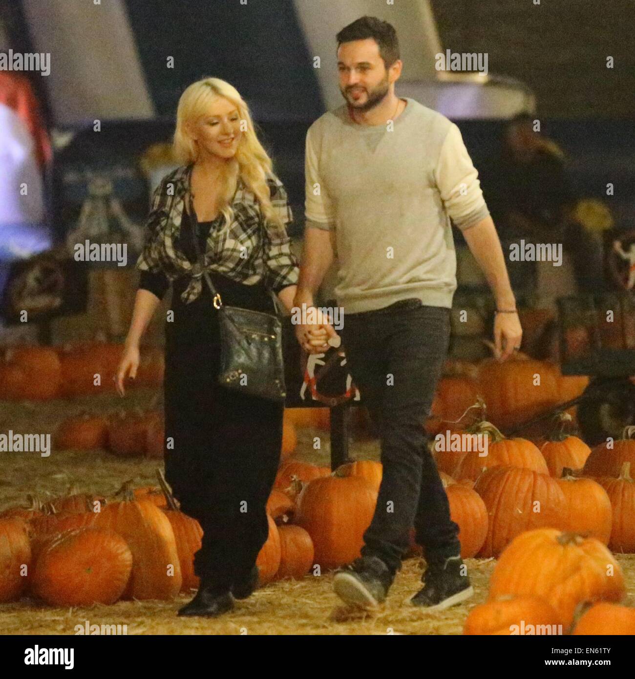 Christina Aguilera arrives at the Mr. Bones Pumpkin Patch with her fiancé Matthew Rutler ...