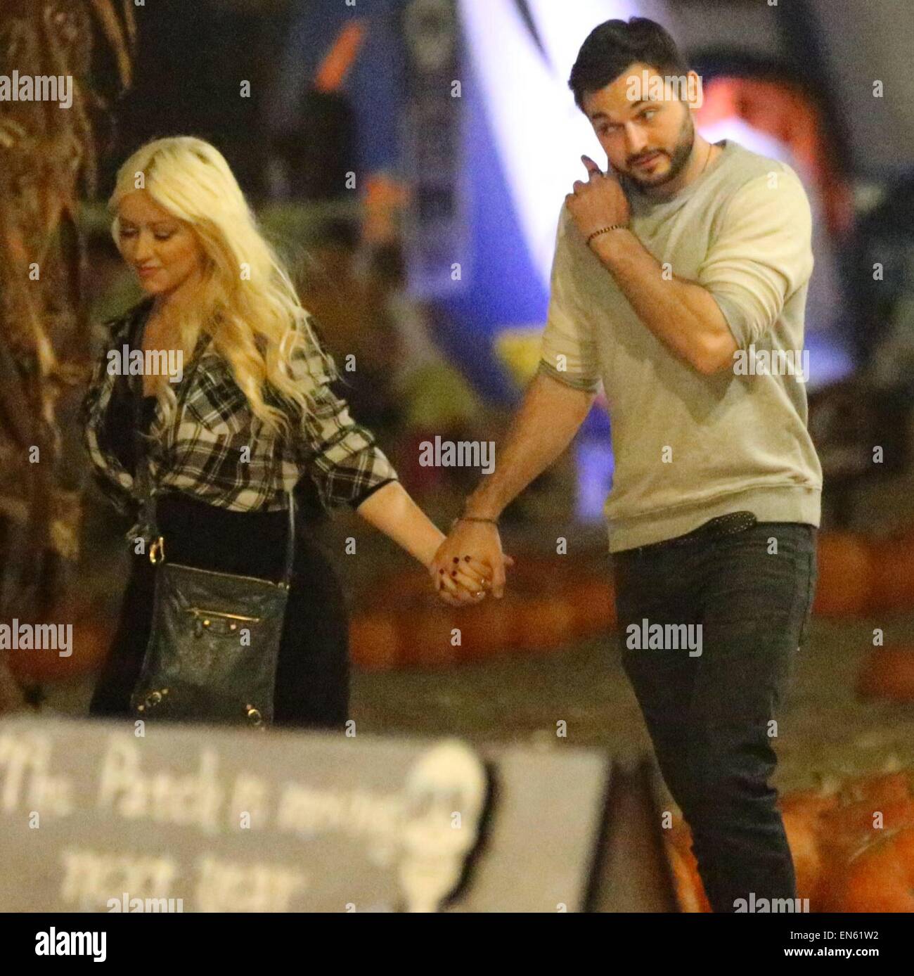 Christina Aguilera arrives at the Mr. Bones Pumpkin Patch with her fiancé Matthew Rutler ...