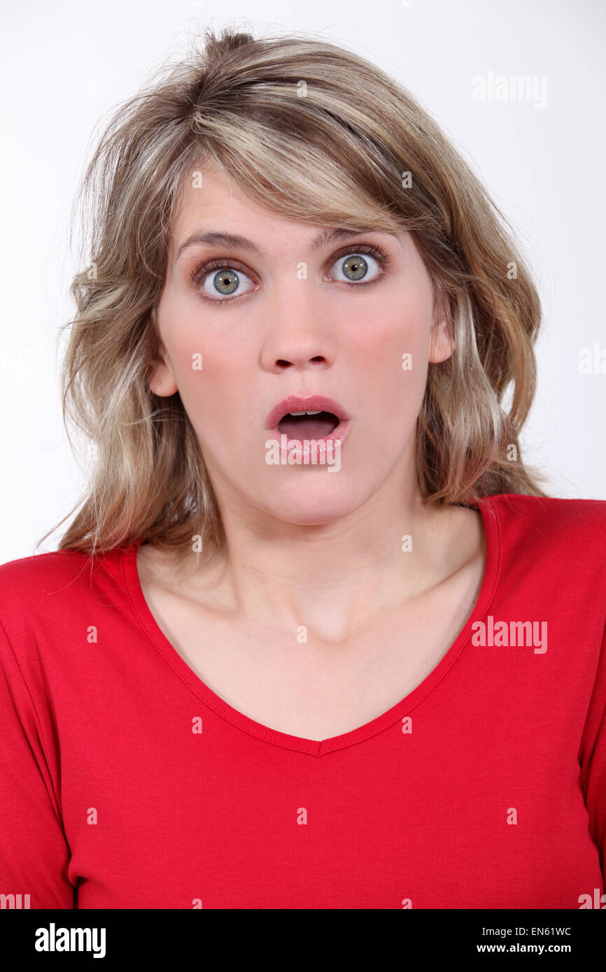 woman looking surprised Stock Photo - Alamy