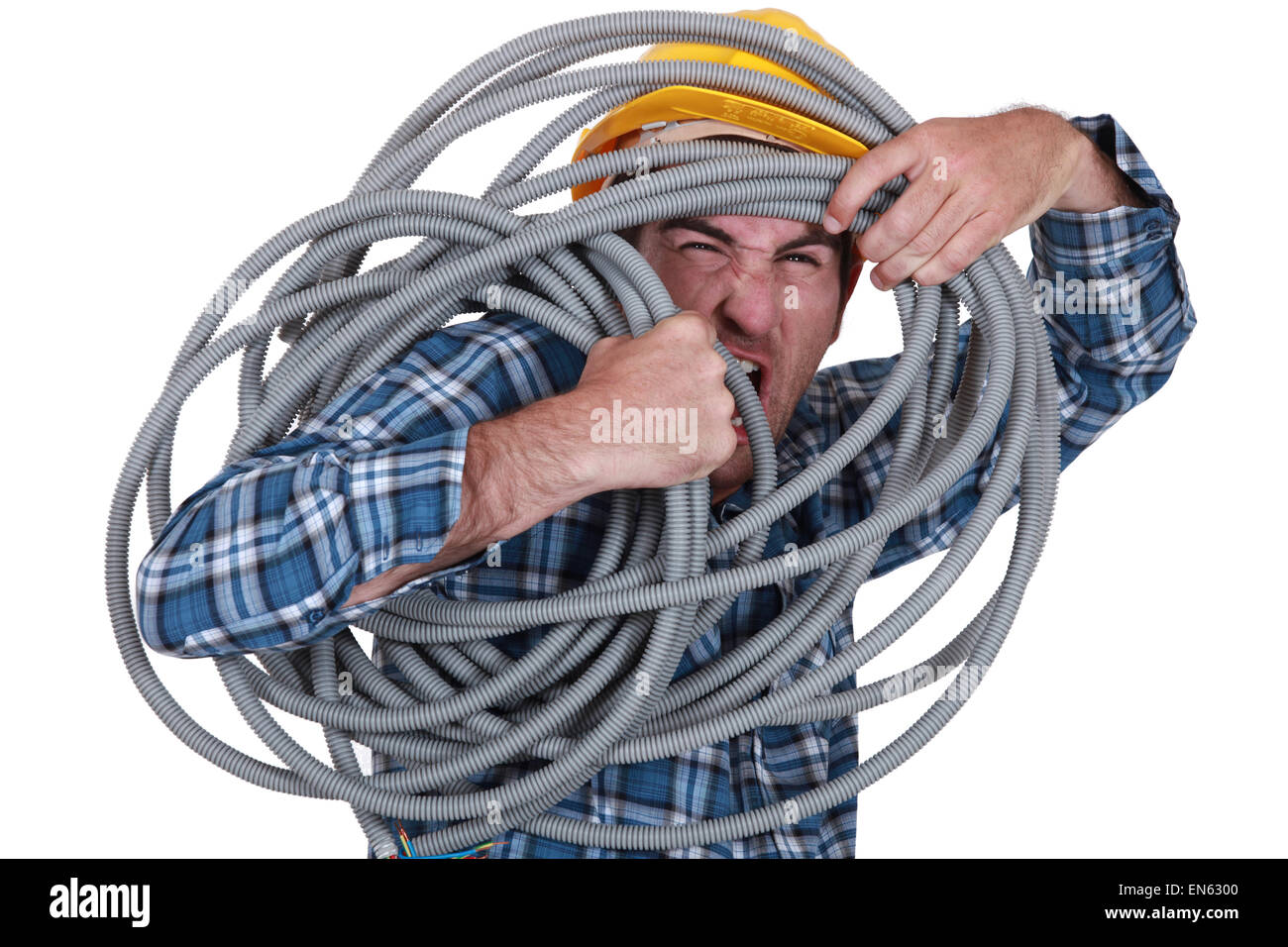 Man tangled in cable Stock Photo - Alamy