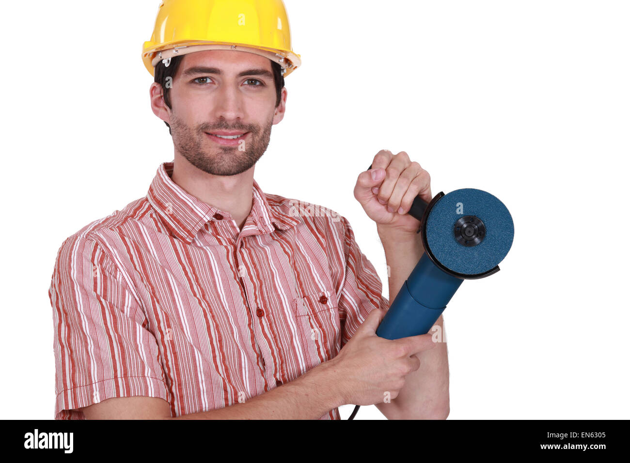 Man holding angle-grinder Stock Photo - Alamy