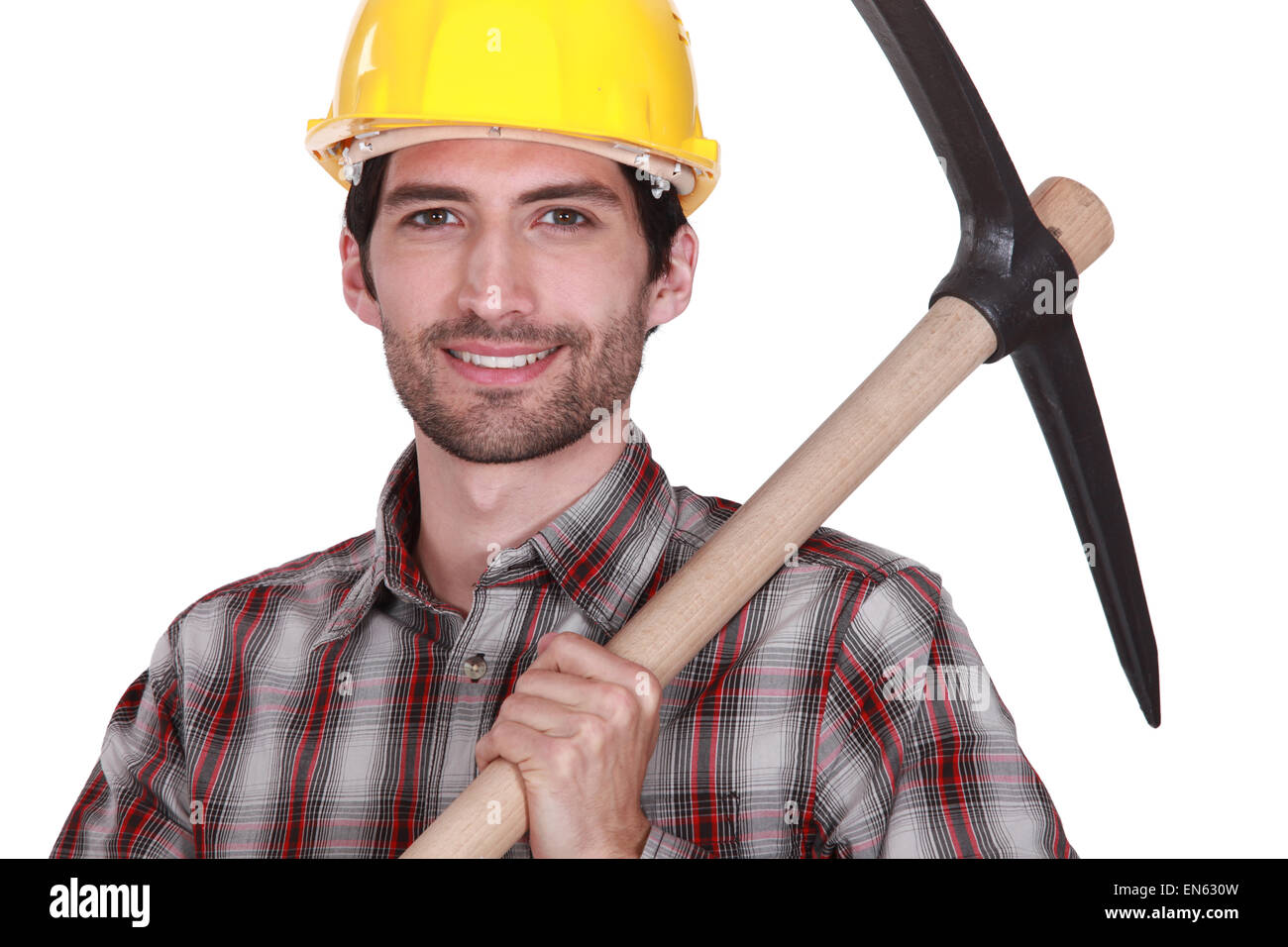 A construction worker with a pickaxe Stock Photo - Alamy