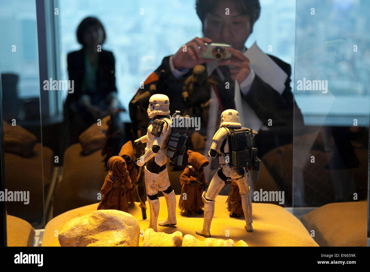 Tokyo, Japan. 28th Apr, 2015. A member of the press takes pictures of ...