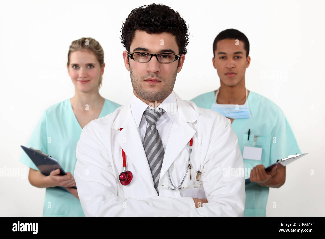 Doctor and interns Stock Photo - Alamy