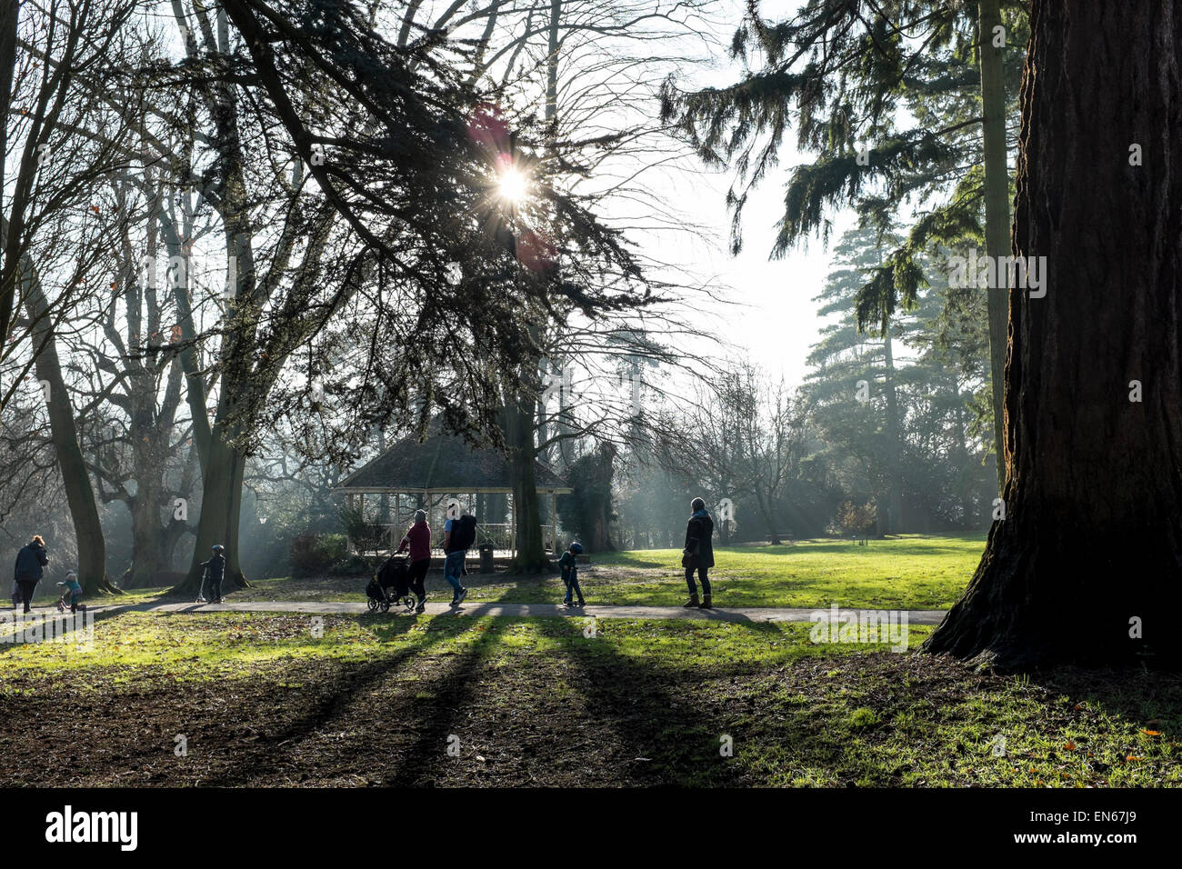 People enjoying a sunny winter afternoon in Stratford Park, Stroud ...
