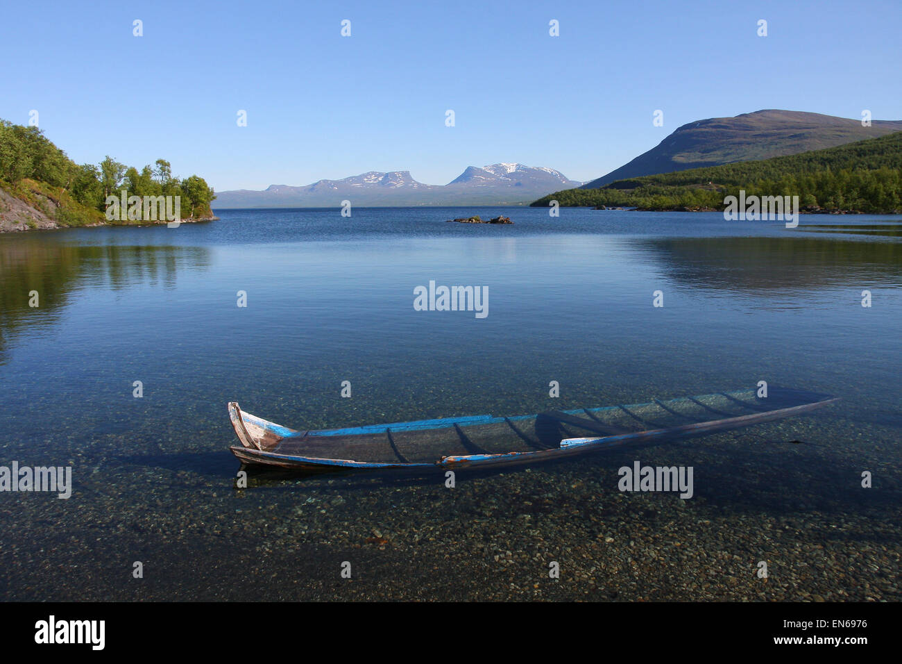 Laporten in Abisko swedish lapland, with a rowing boat in foreground ...