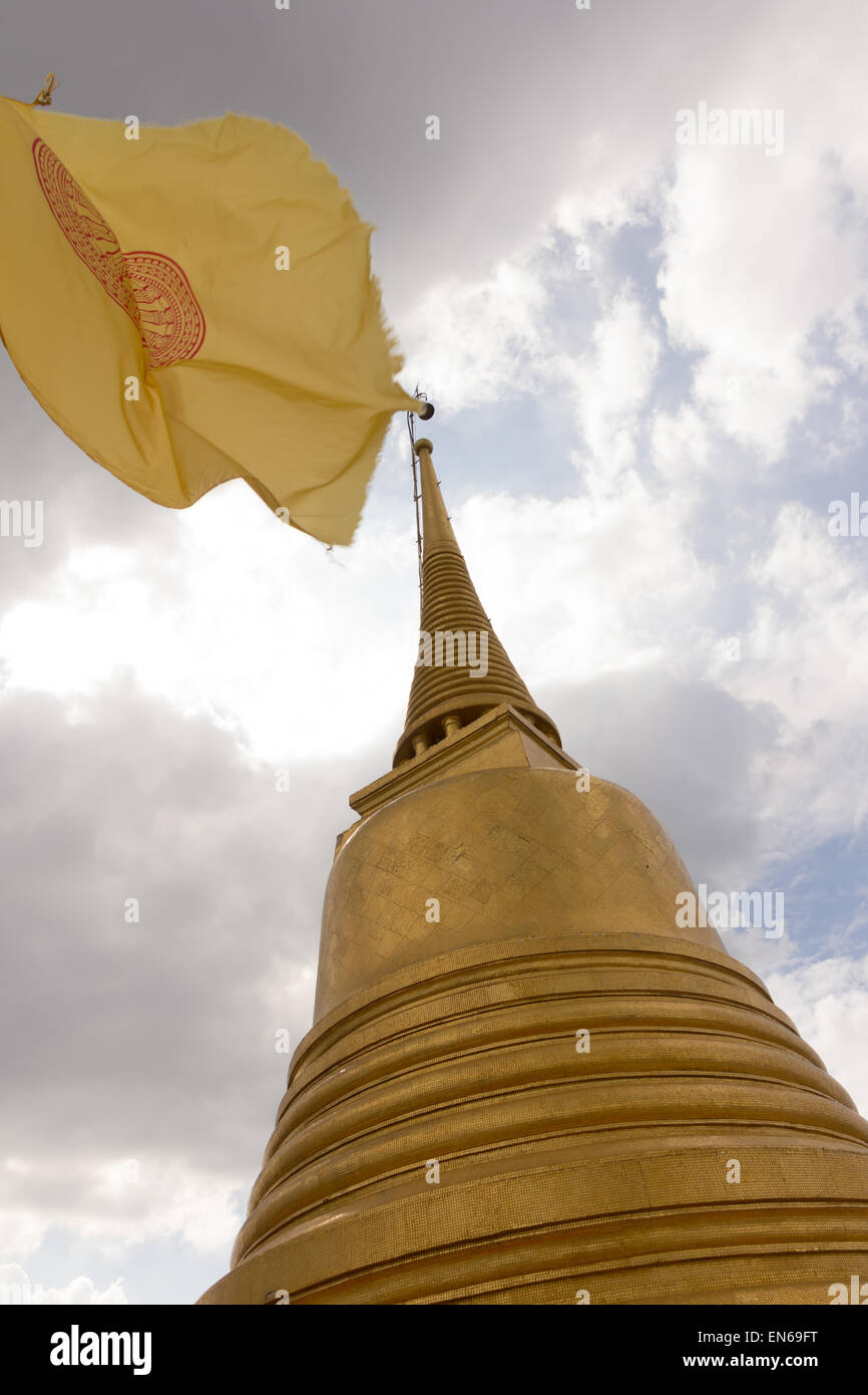 Golden Pagoda with dhama flag Stock Photo - Alamy