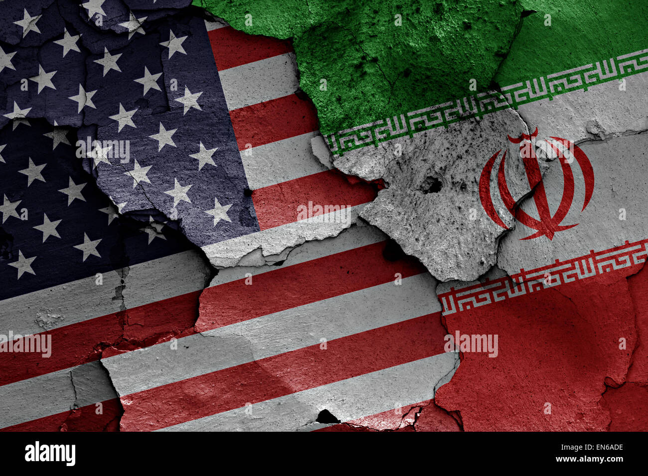flags of USA and Iran painted on cracked wall Stock Photo - Alamy