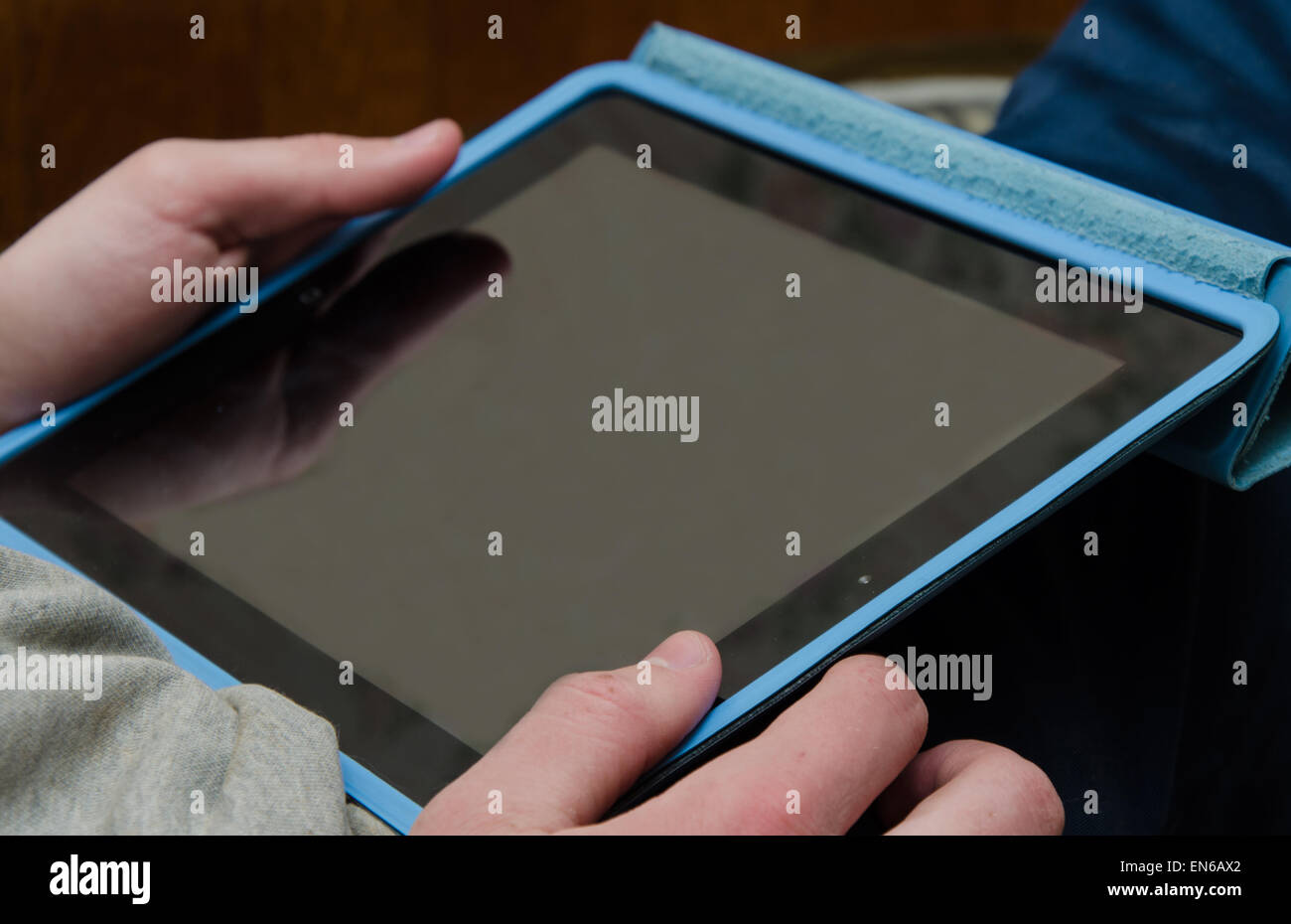 Tablet in the Hands Stock Photo - Alamy