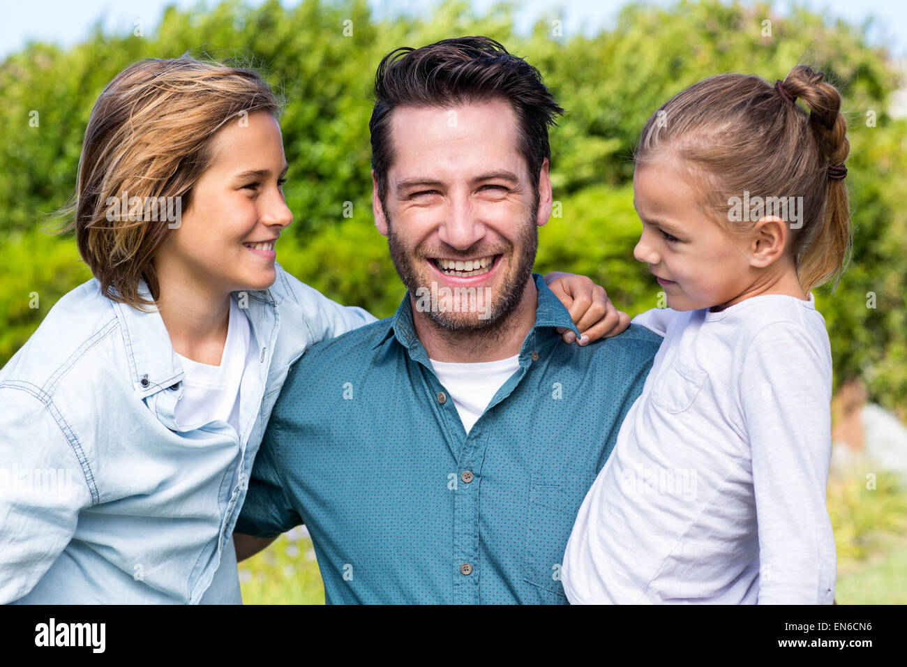 Happy father with his children Stock Photo - Alamy