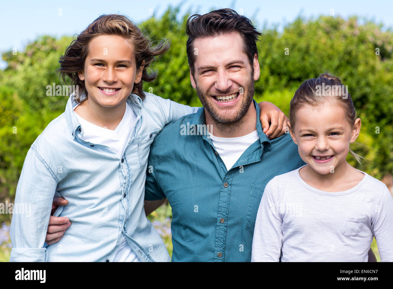Happy father with his children Stock Photo - Alamy