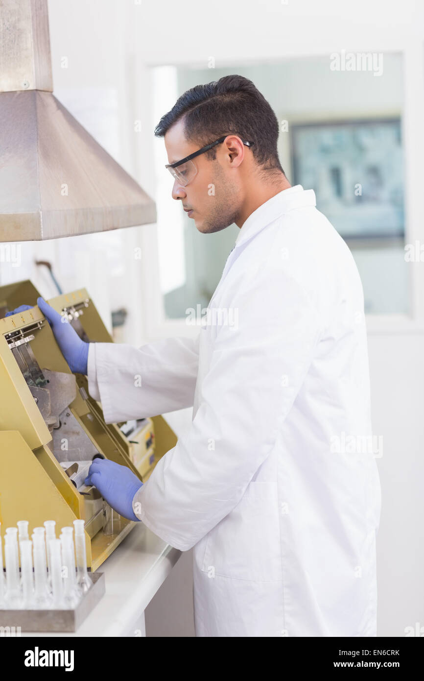 Scientist using technology for research Stock Photo - Alamy