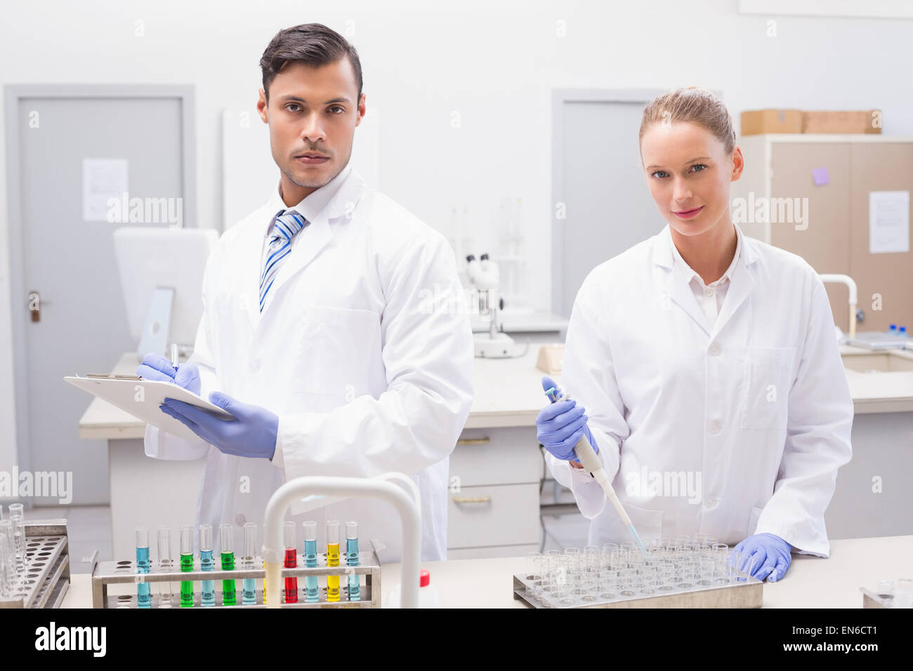 Man woman scientists writing hi-res stock photography and images - Alamy